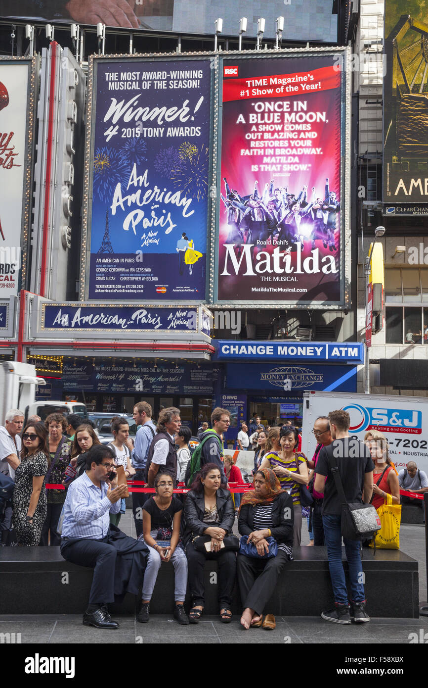 People lined up to buy discount theater tickets in the Times Square ...