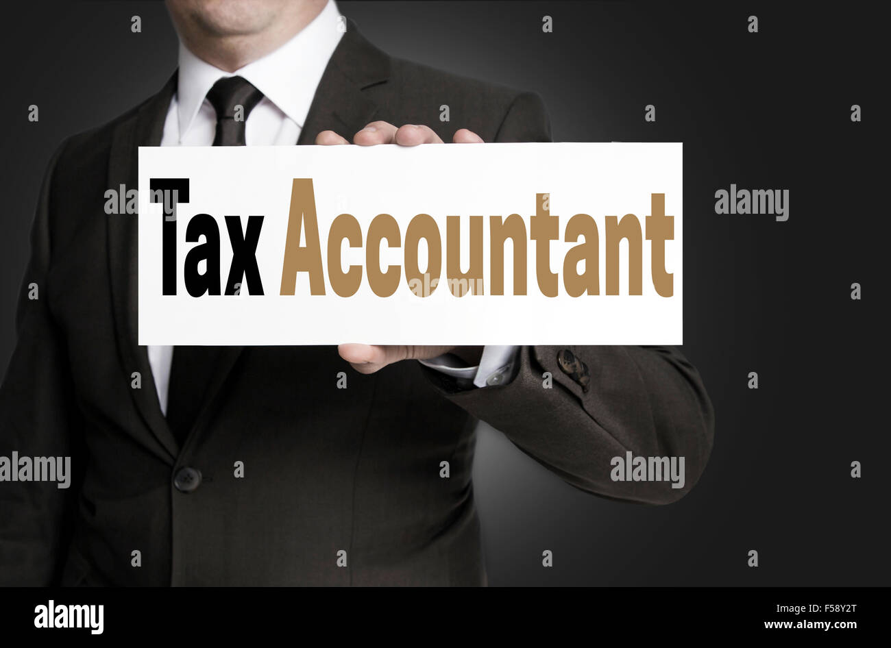 Tax accountant sign is held by businessman concept Stock Photo - Alamy