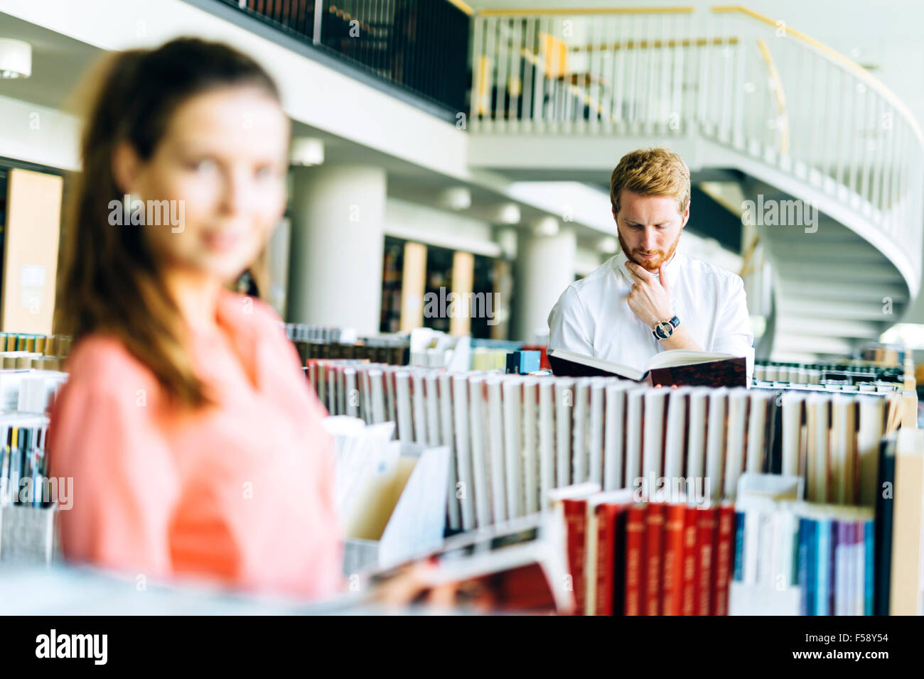 Student studying in library hi-res stock photography and images - Alamy