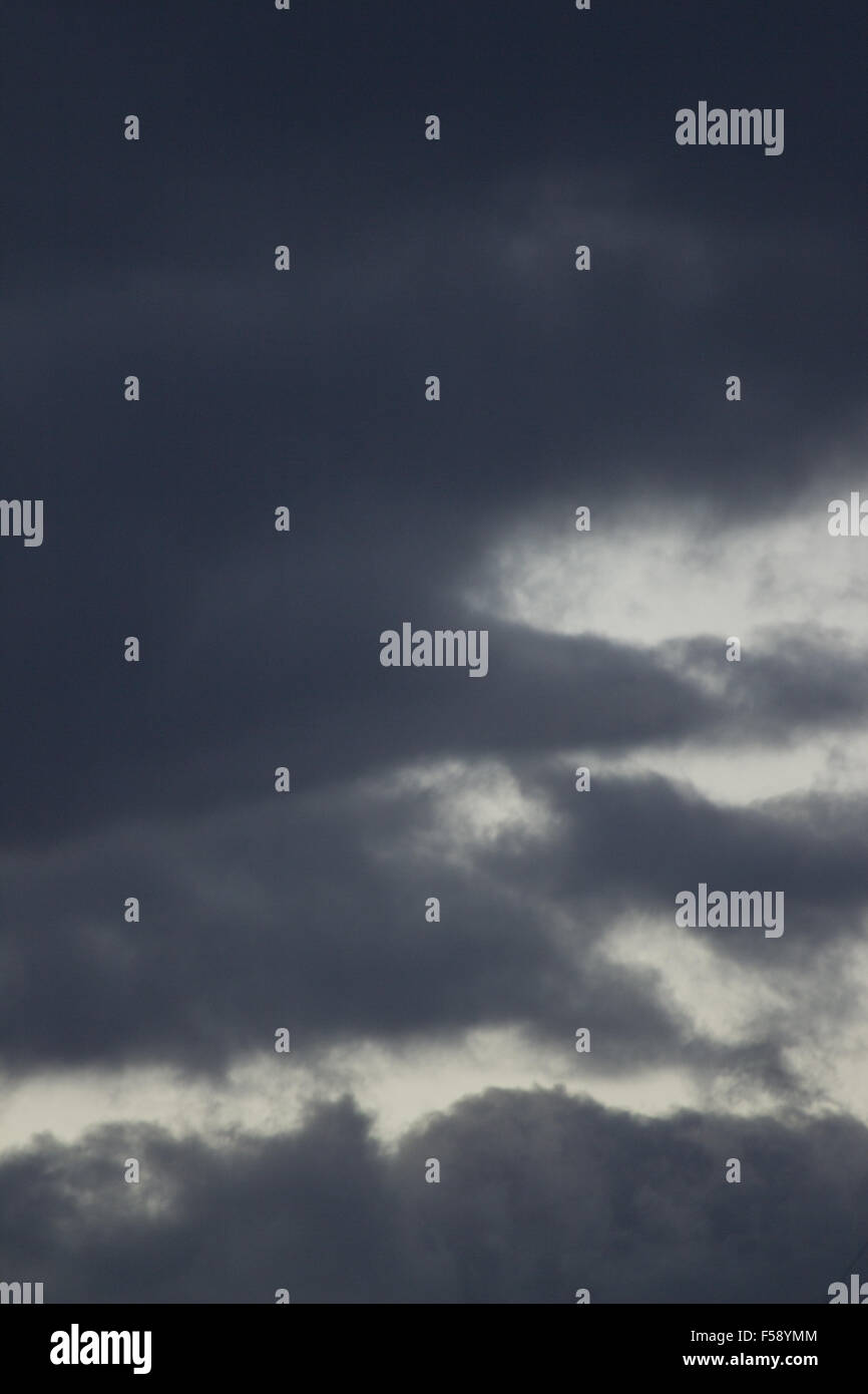 Contracting thunderstorm dark stormy gray blue clouds sky vertical ...