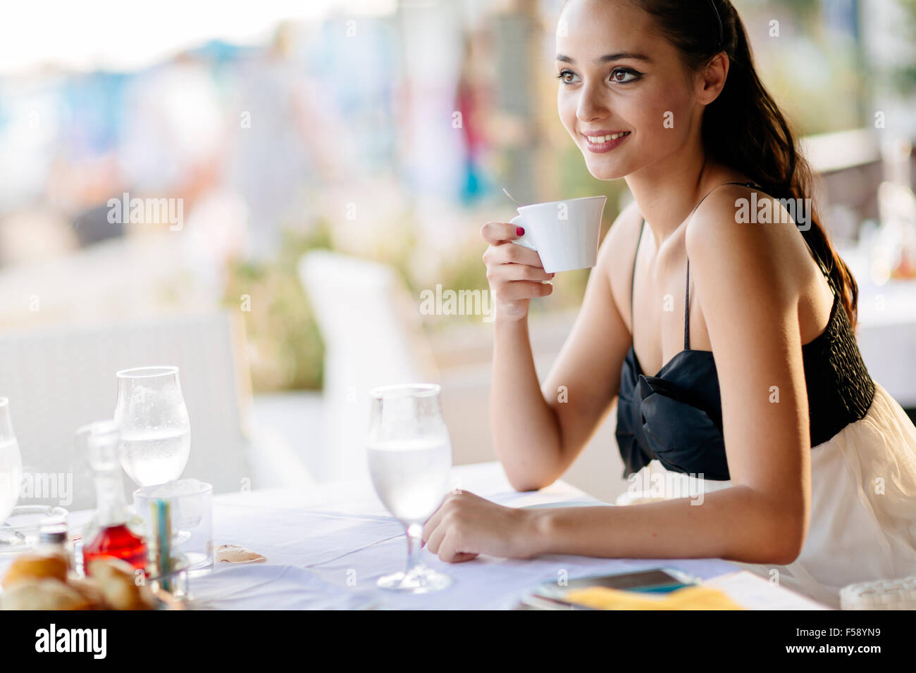 Beautiful woman drinking tea hi-res stock photography and images - Alamy