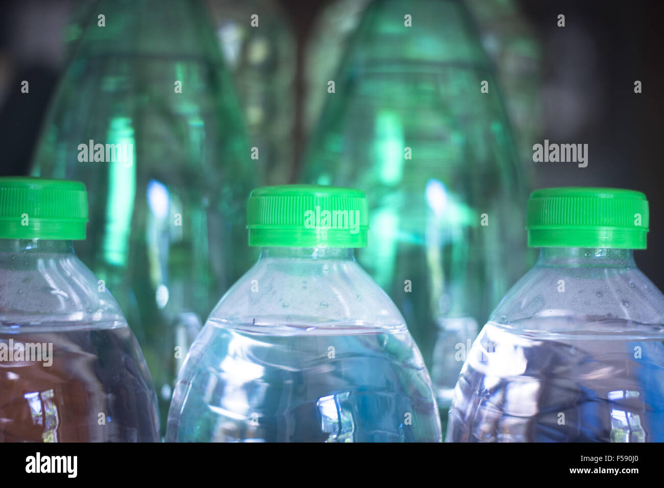Plastic water bottles in window light closeup color photo Stock Photo ...