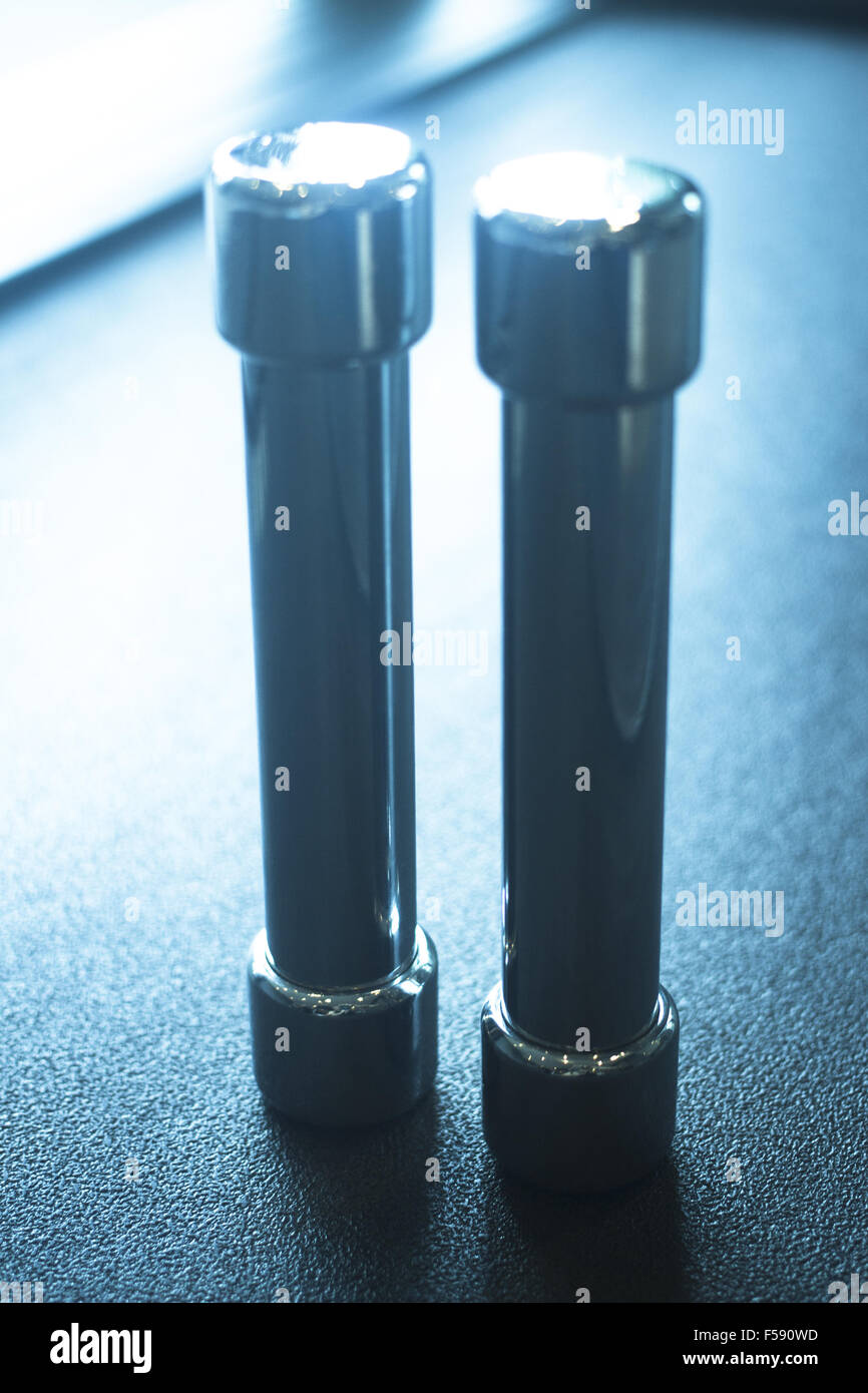 Dumbbell gym metal weights in exercise room in sports bodybuilder gym ...
