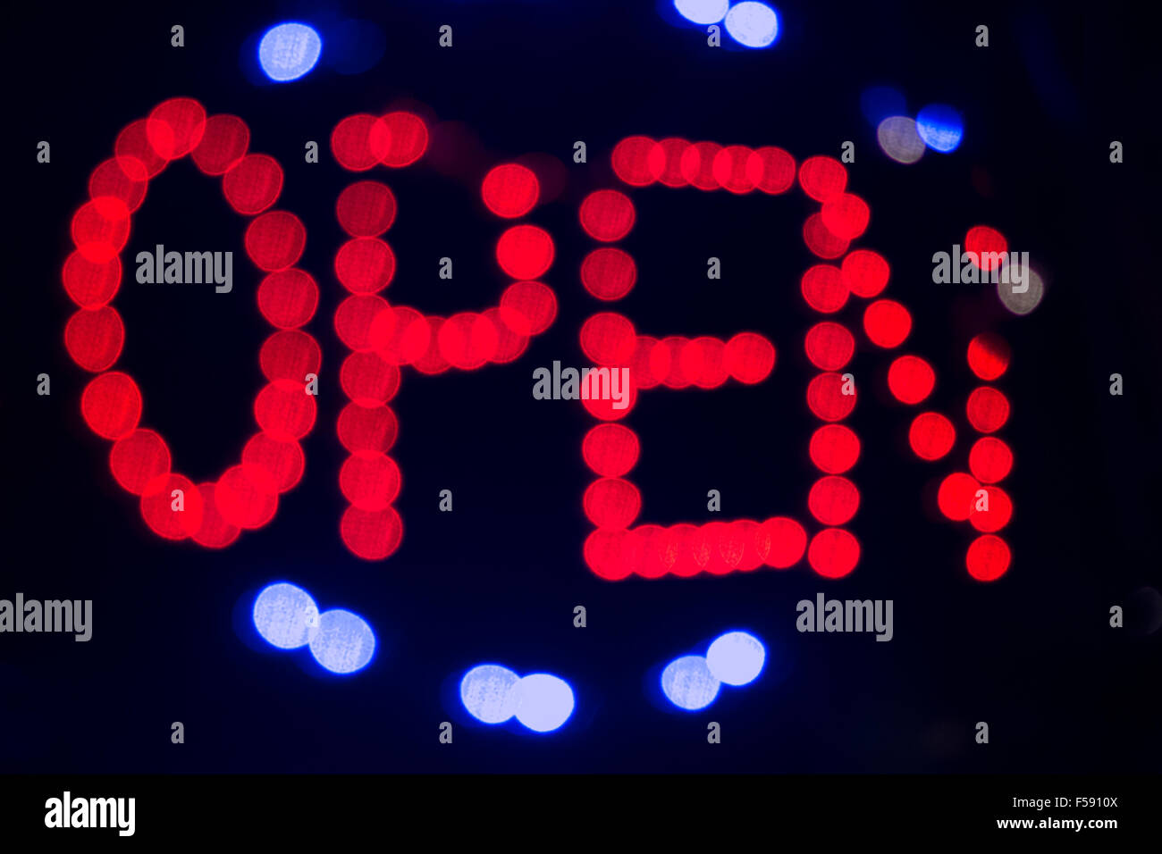 Neon open sign at night in street photo Stock Photo - Alamy