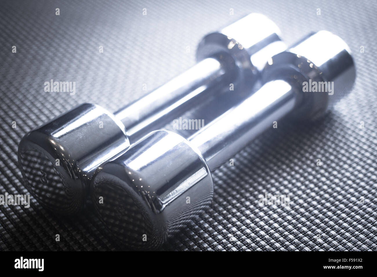 Dumbbell gym metal weights in exercise room in sports bodybuilder gym ...