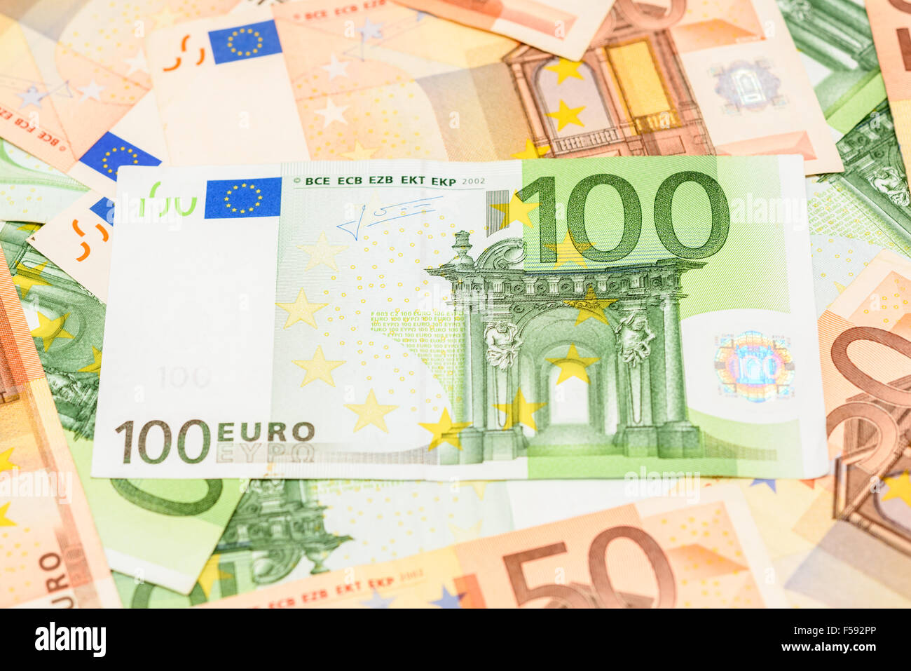 One Hundred Euro Banknote On Euro Bills Background Stock Photo - Alamy