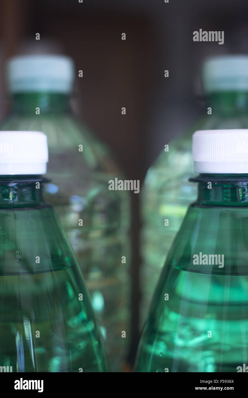 Plastic water bottles in window light closeup color photo Stock Photo ...