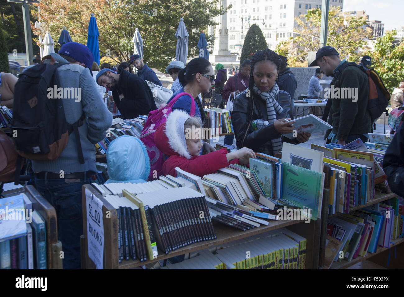 Raise their books hi-res stock photography and images - Alamy