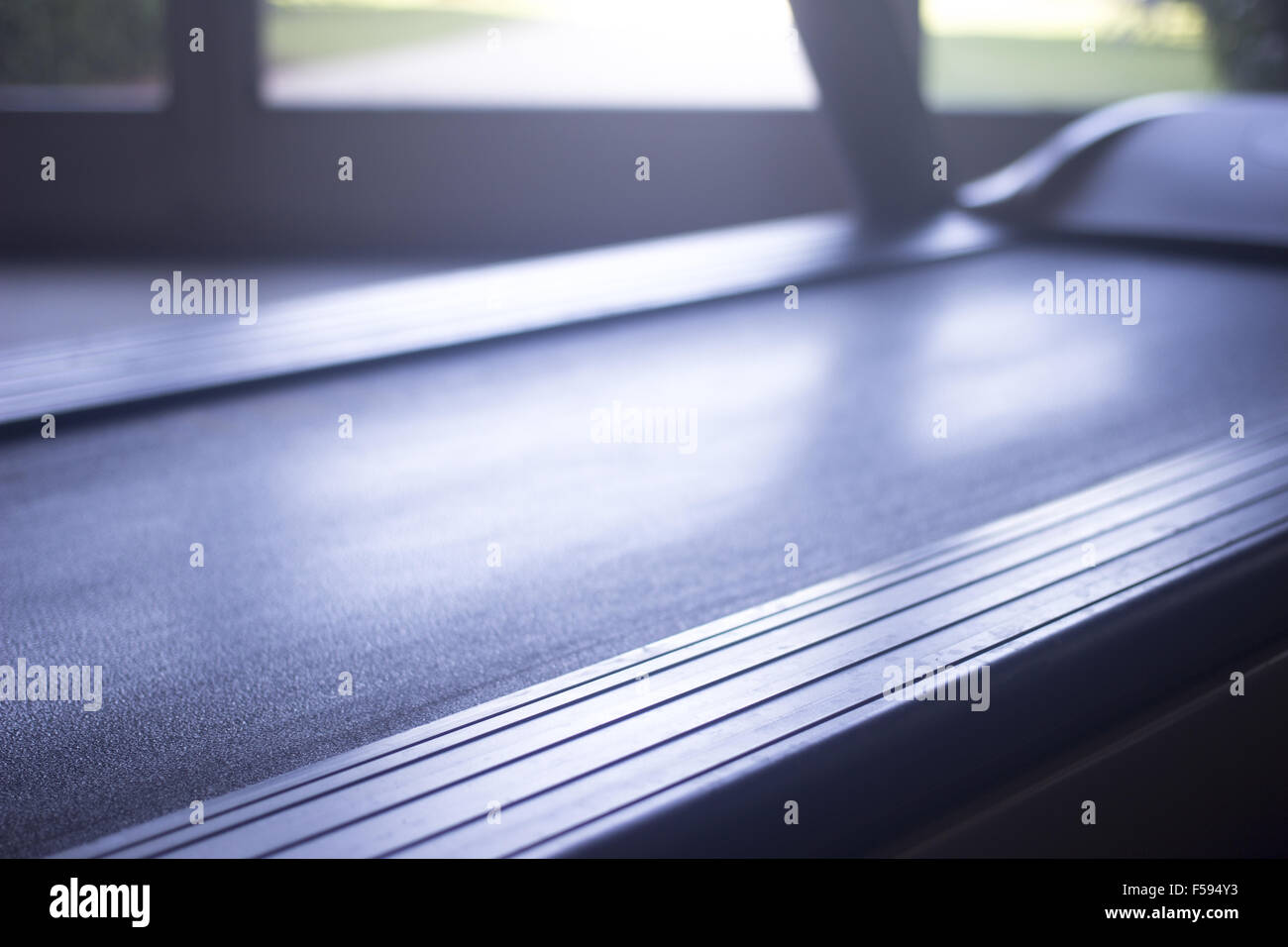 Running machine in exercise room in sports bodybuilder gym health club ...