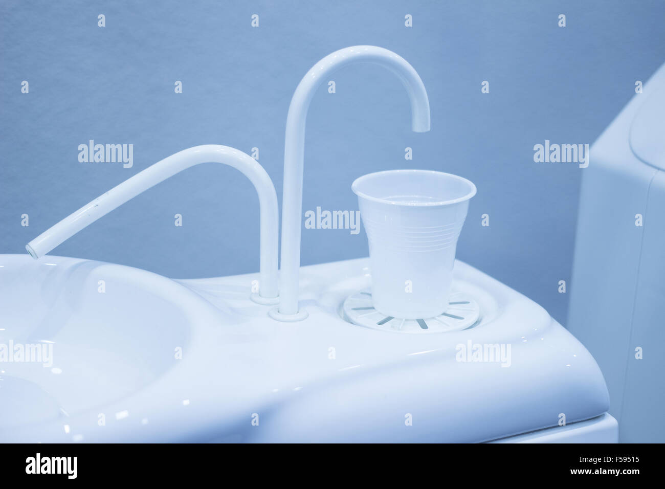 Dentist's water mouth washing cup tap pipe filler in dental clinic in ...