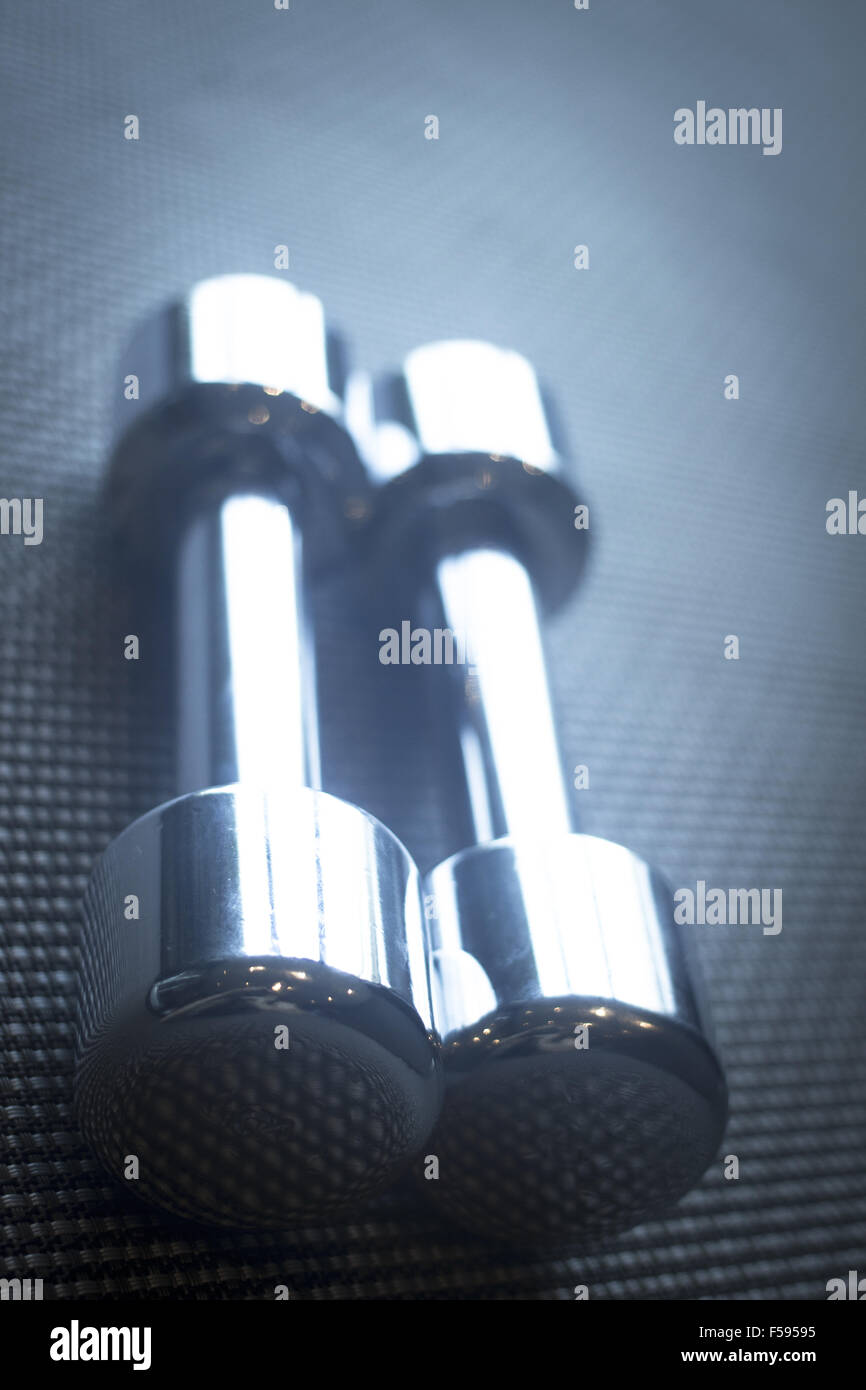 Dumbbell gym metal weights in exercise room in sports bodybuilder gym ...