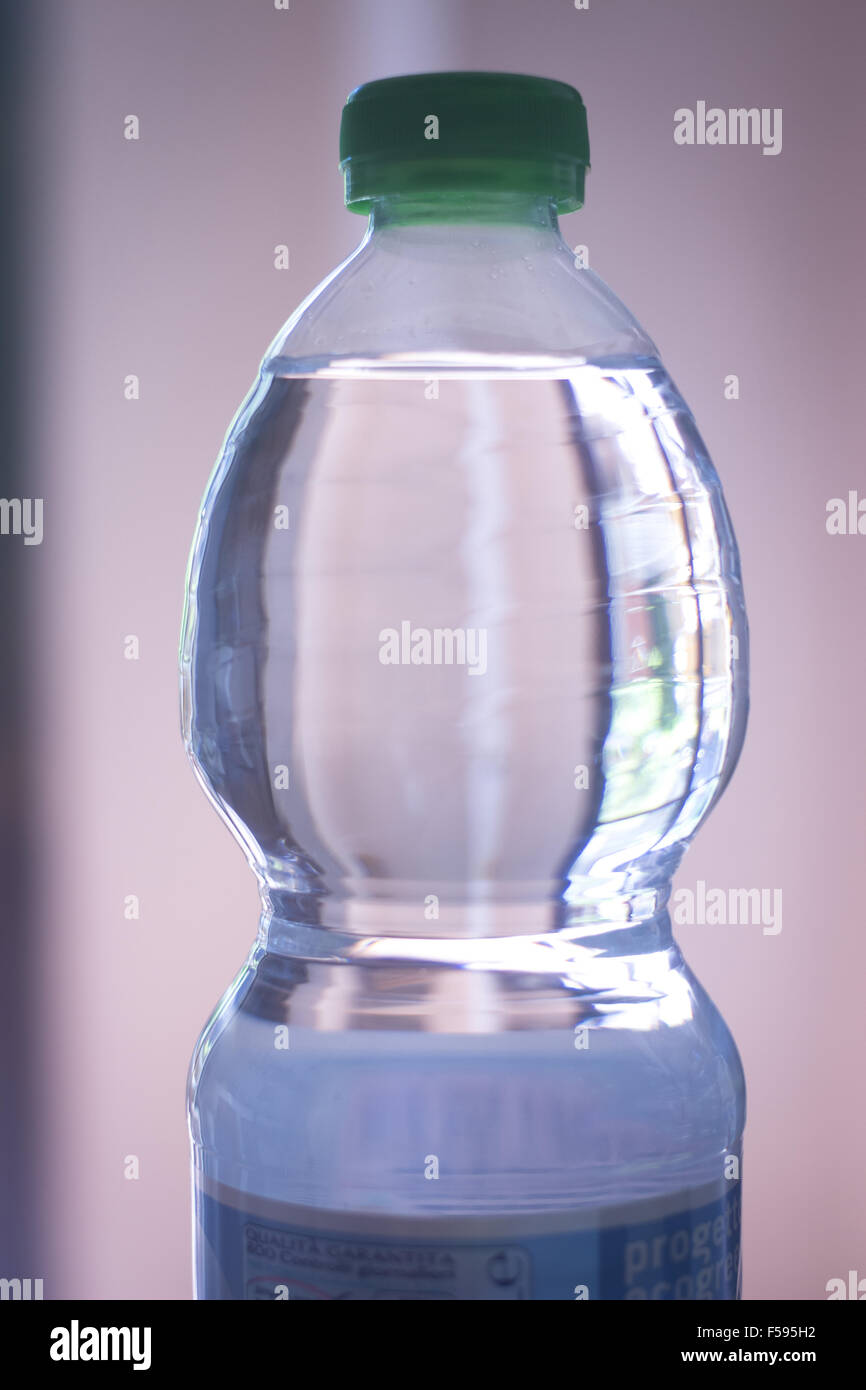 Plastic water bottle in window light closeup color photo Stock Photo ...