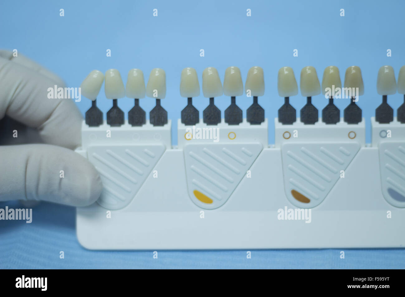 Dentist's tooth color guide used to choose the appropriate natural ...