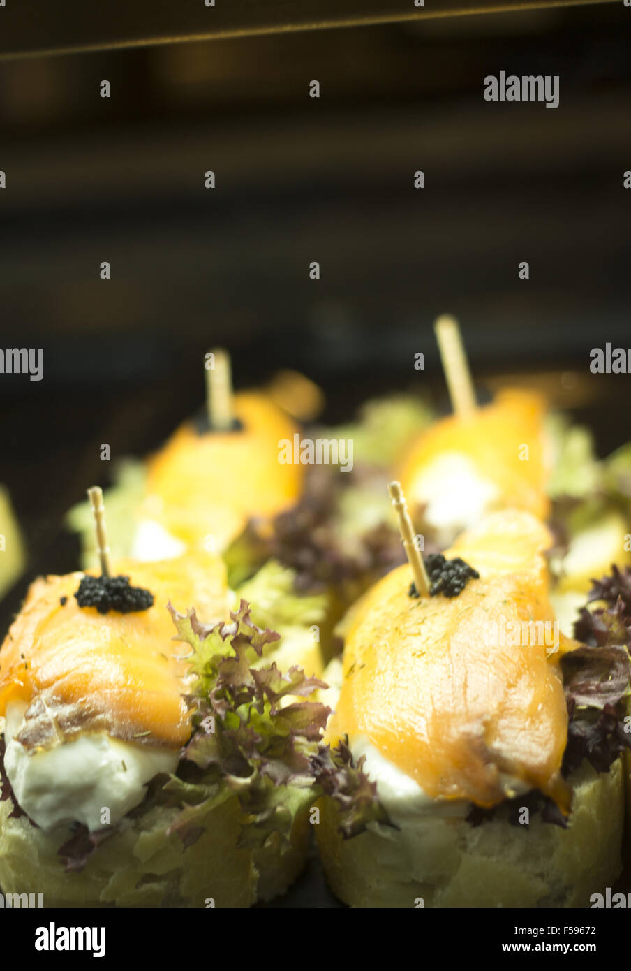 Spanish cuisine smoked salmon tapas dishes in restaurant cafe pinchos ...