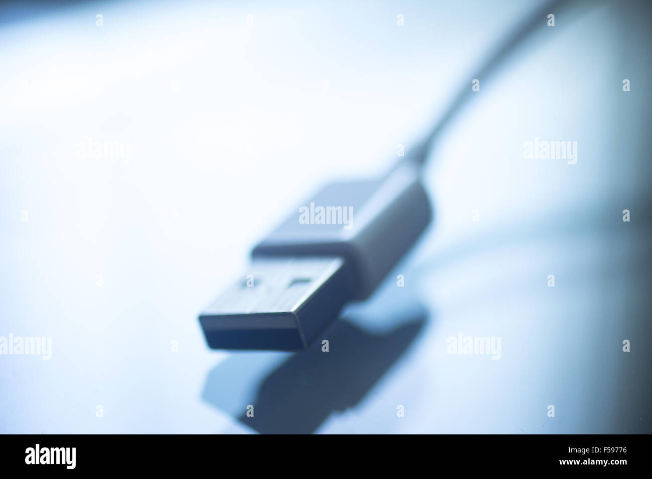 USB 3 cable IT PC memory storage dongle plug socket close-up color ...