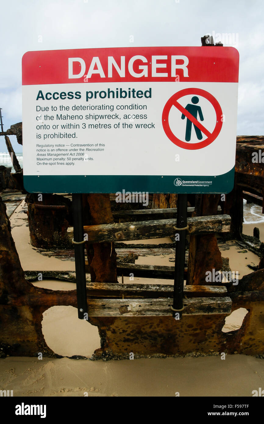 Fraser Island, Australia. Sign warning tourists not to climb on or ...
