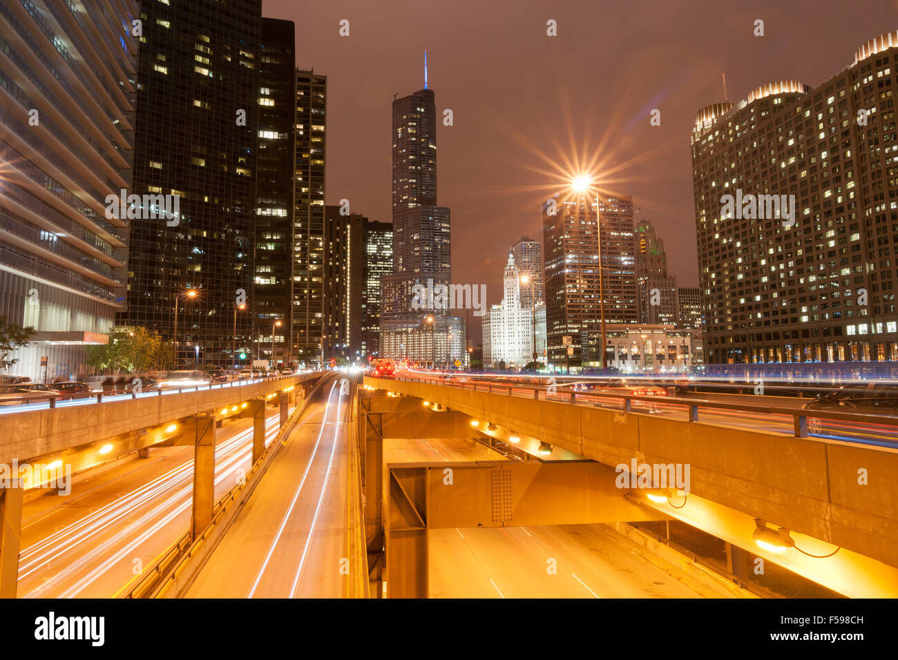Chicago buildings, towering overhead, overground railway, urban road ...