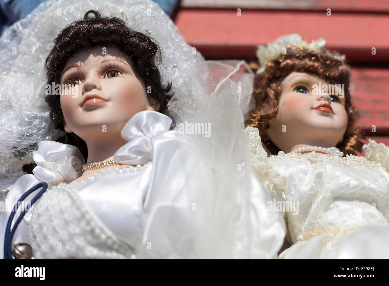 old puppet with wedding dress on a flea market Stock Photo - Alamy