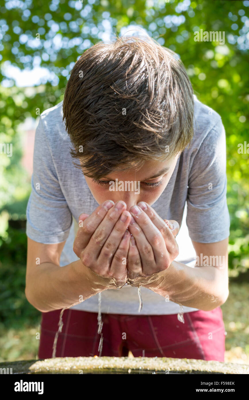 Drinking Water From Cupped Hands High Resolution Stock Photography and ...
