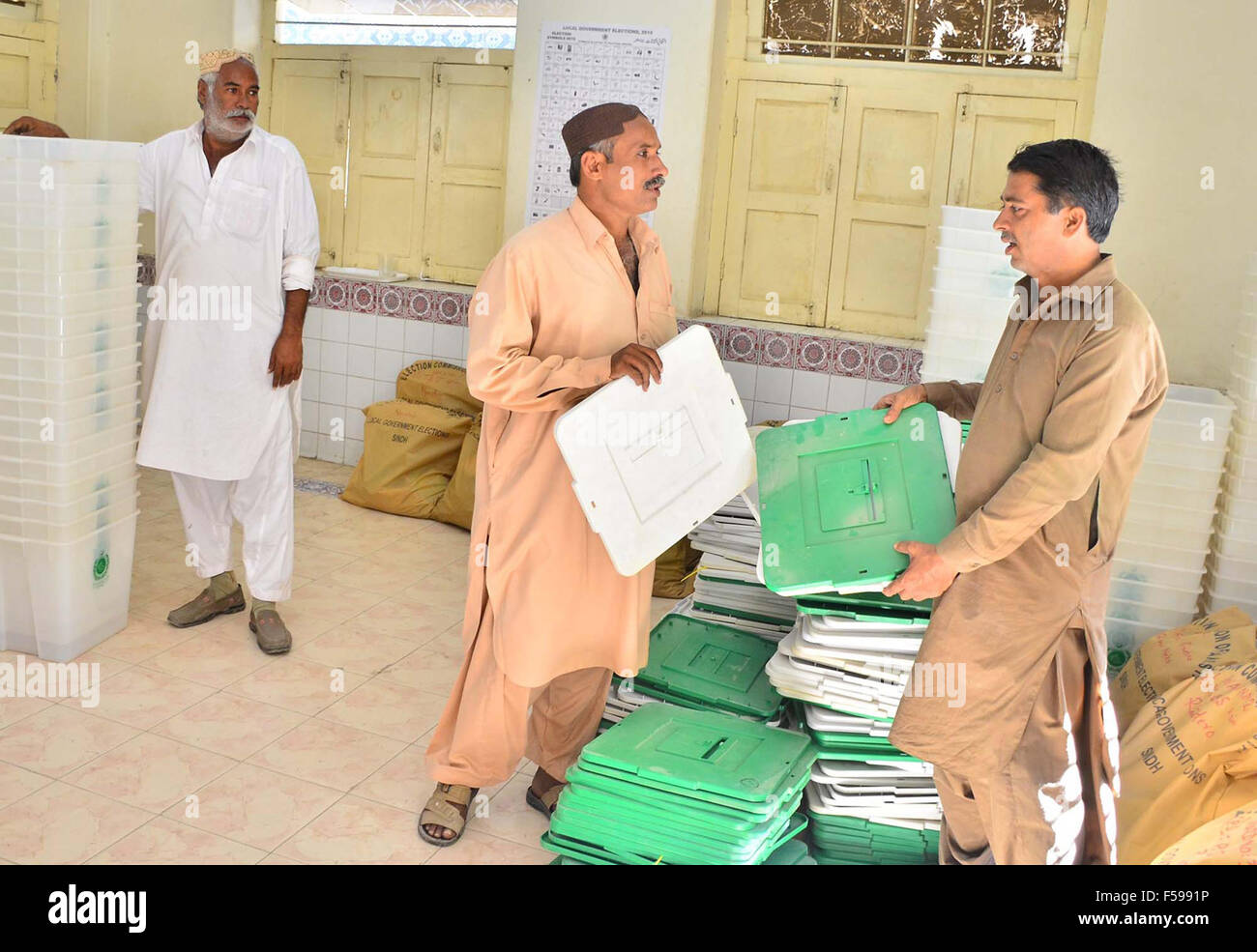 Presiding Officers and other election staff are receiving and shifting ...