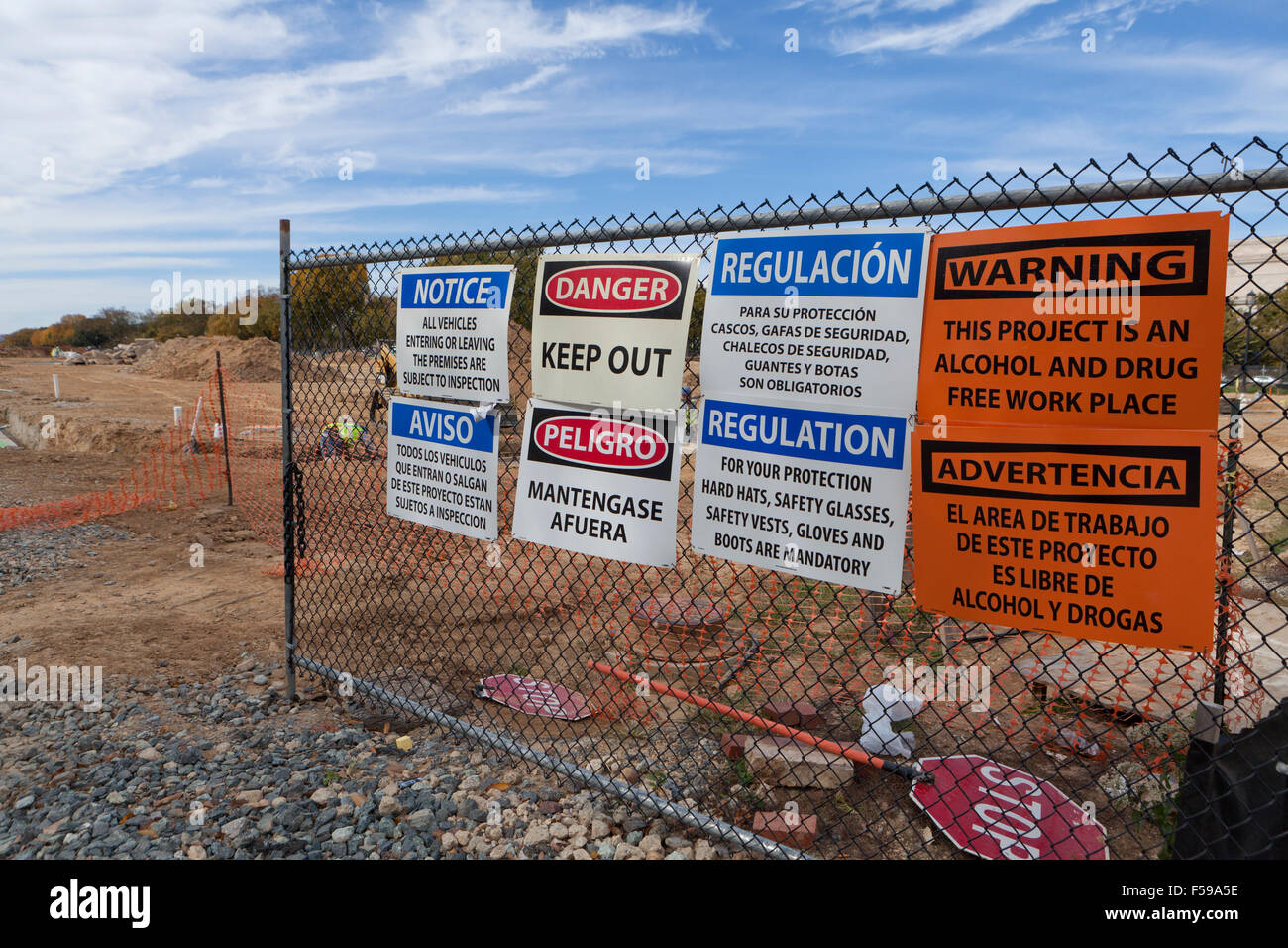 Danger warning signs at construction site - USA Stock Photo - Alamy