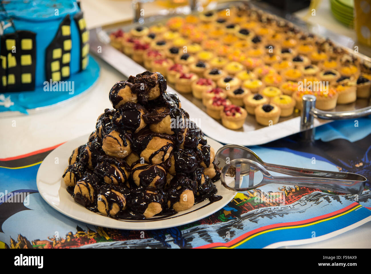 Delicious birthday profiterole chocolate cake with buttercream baked ...