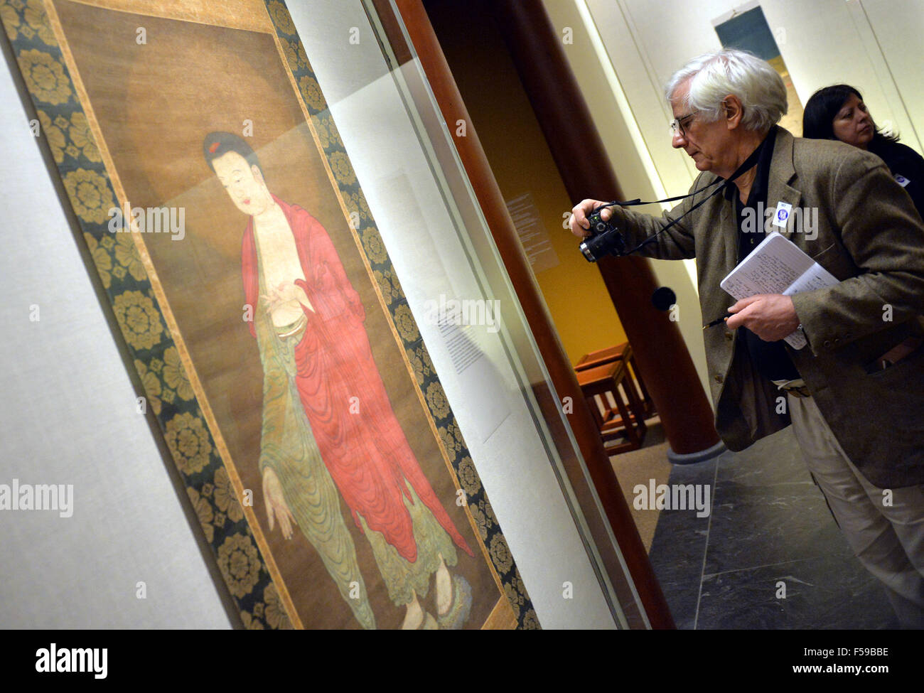 New York, USA. 30th Oct, 2015. A visitor attends the media preview of ...