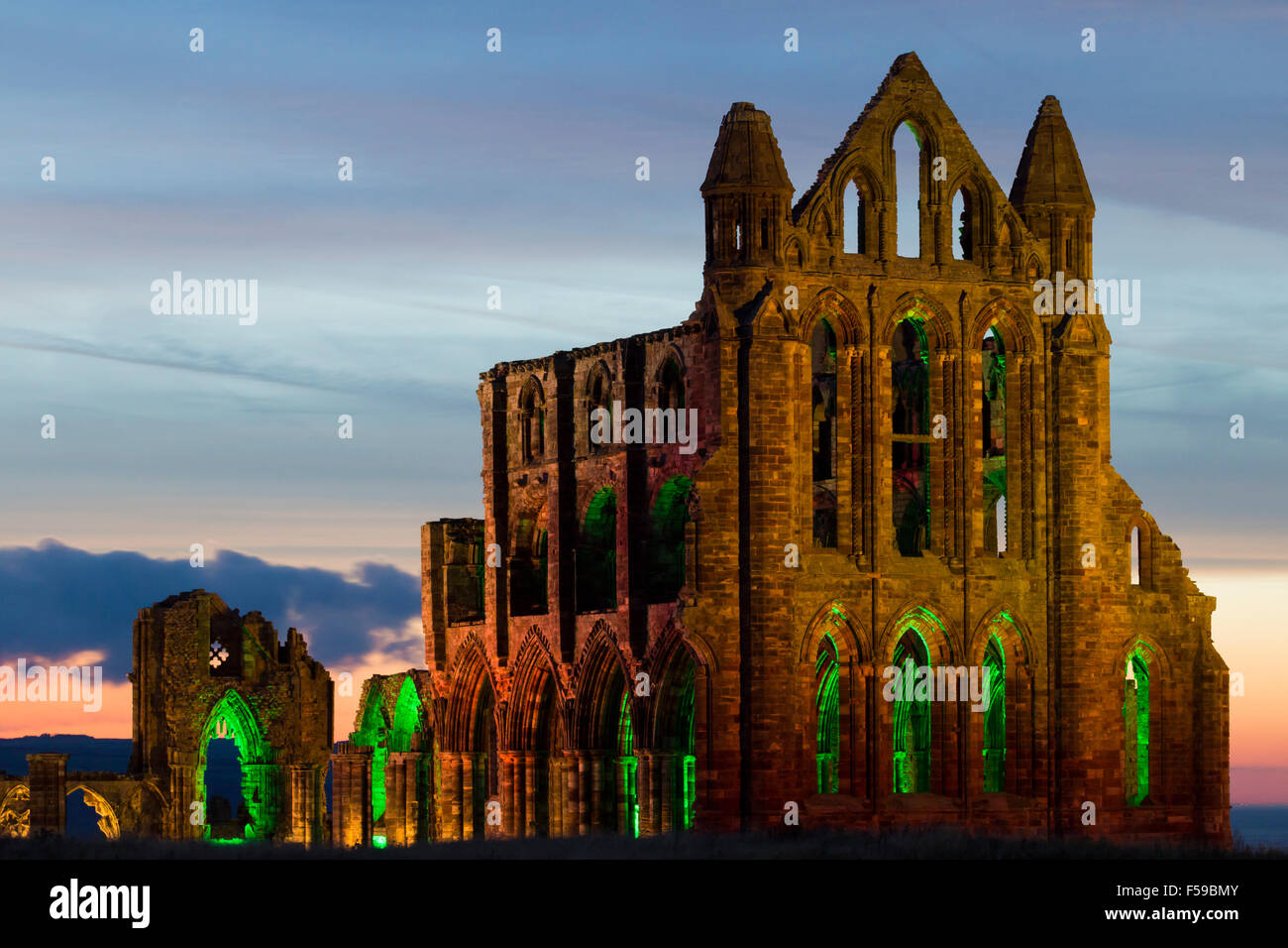 Whitby Abbey illuminated during Goth/Halloween weekend. Whitby, North ...