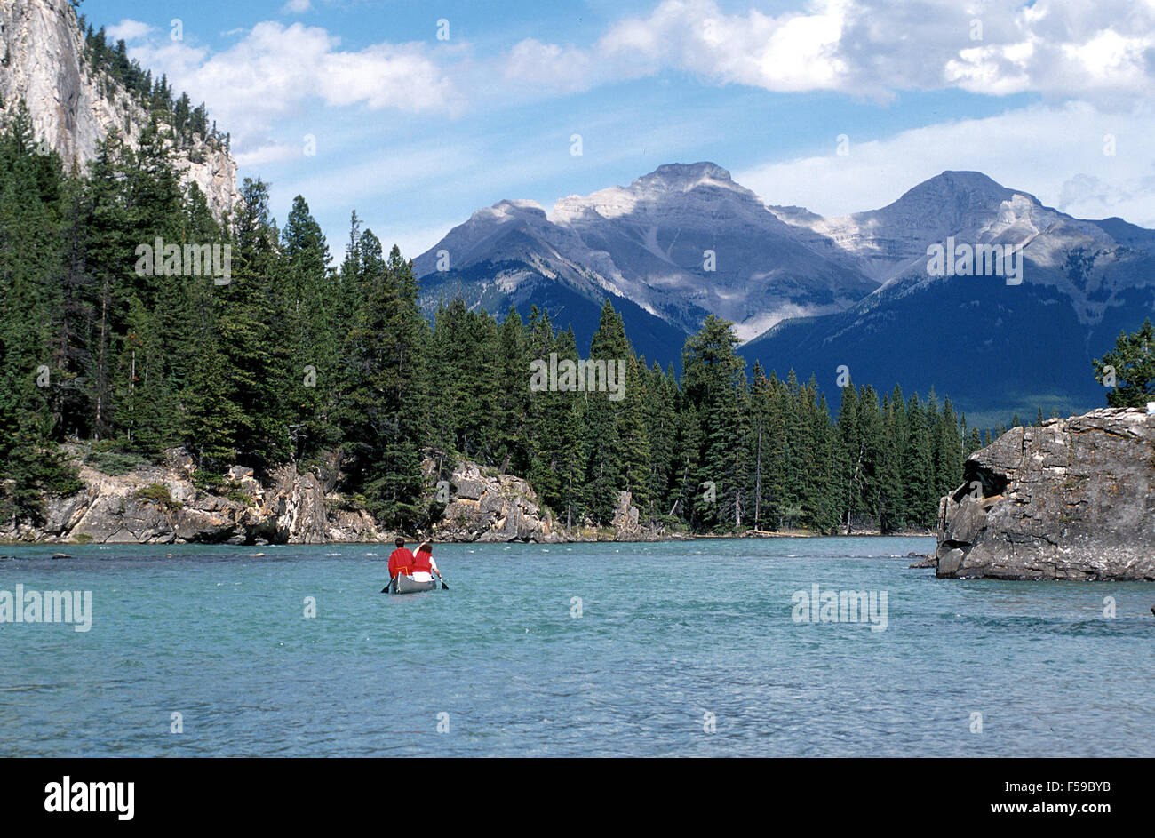 Canoe on Bow River below Bow Falls, Banff National Park Alberta Canada ...