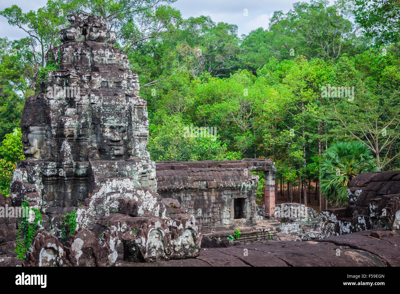 Ancient stone faces of Bayon temple, Angkor, Cambodia Stock Photo - Alamy
