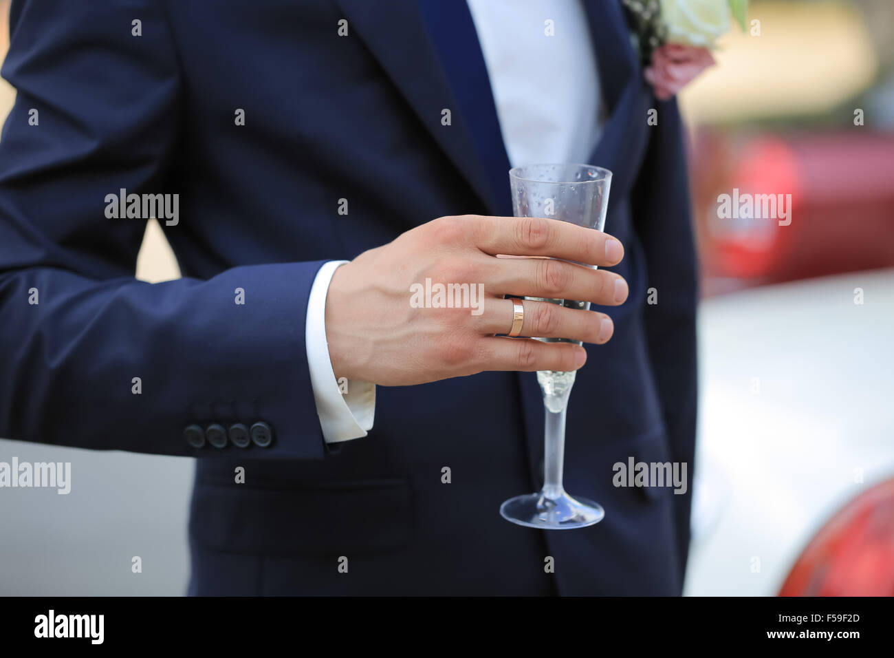 A man with a glass Stock Photo - Alamy