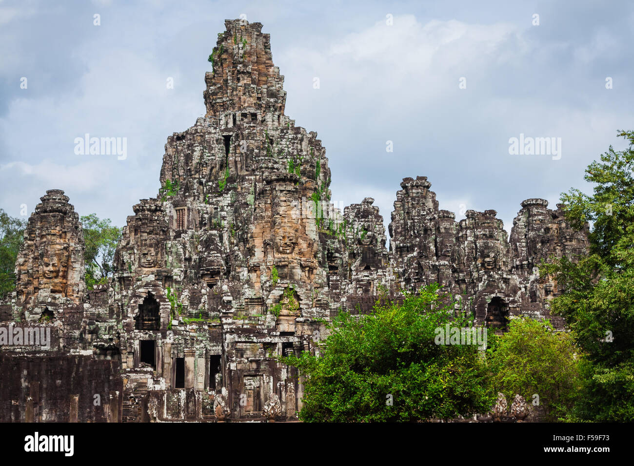 Ancient stone faces of Bayon temple, Angkor, Cambodia Stock Photo - Alamy