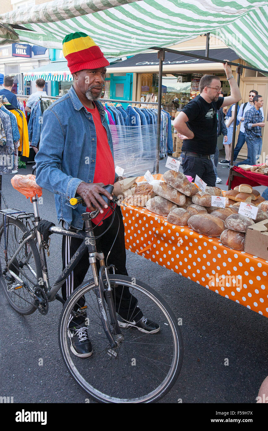 Broadway Market, London E8: rastafarian customer Stock Photo - Alamy