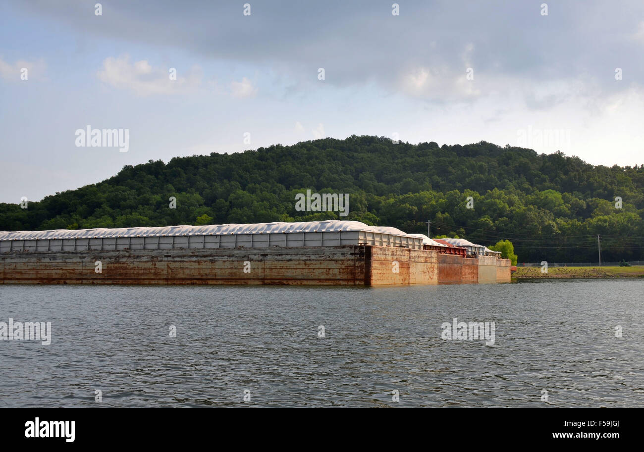Several barges lined up in the water Stock Photo - Alamy