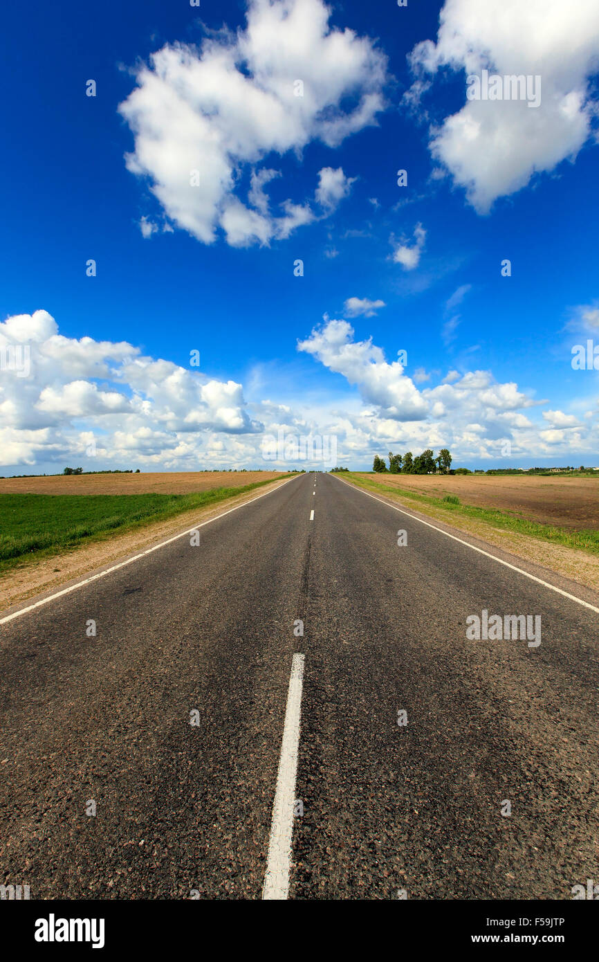 Summer road . field Stock Photo - Alamy