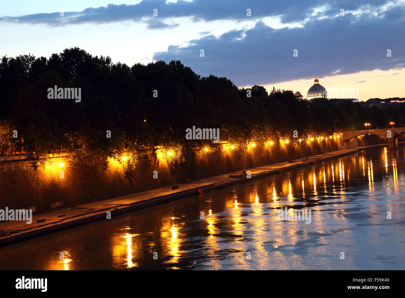 Sunset across the Tiber River in Rome looking towards St Peter's ...