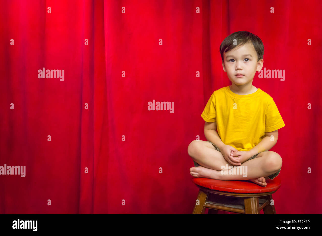Student Sitting Criss Cross Applesauce