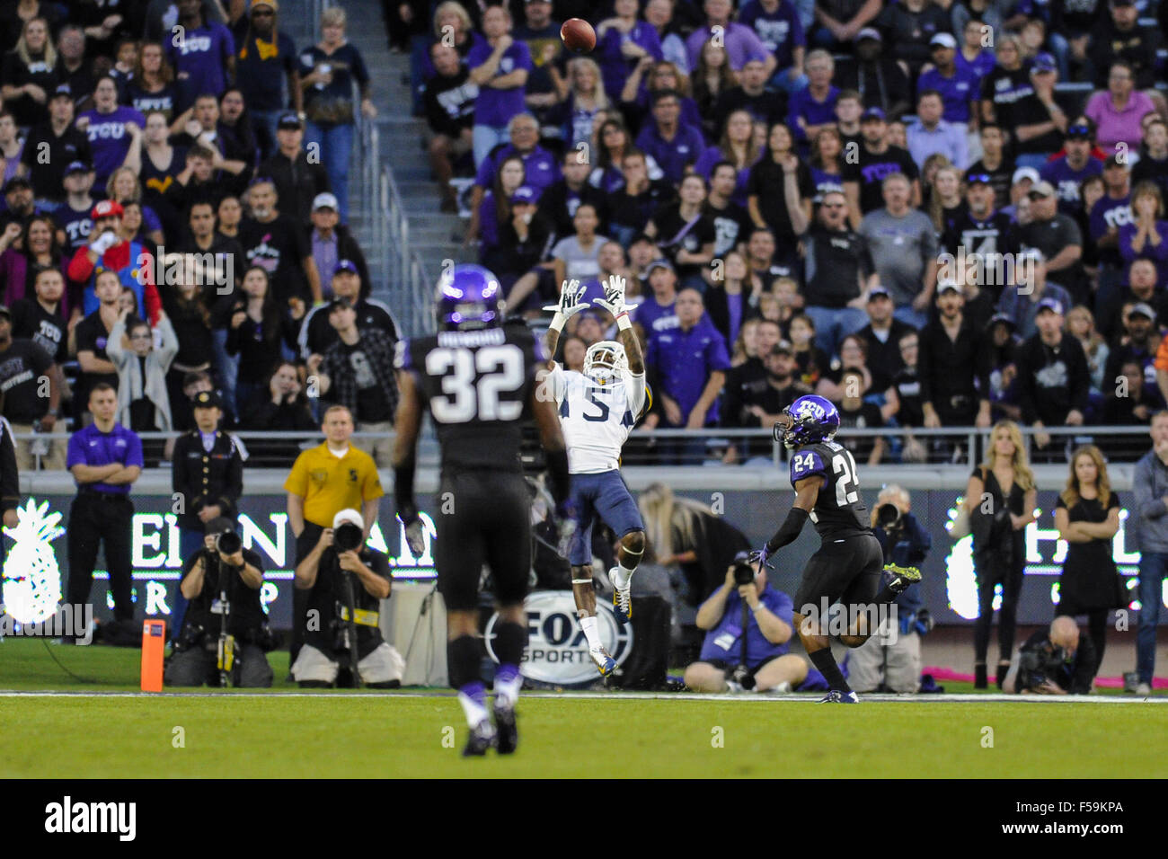 TCU safety Travin Howard (32) and cornerback Julius Lewis (24) watch as ...