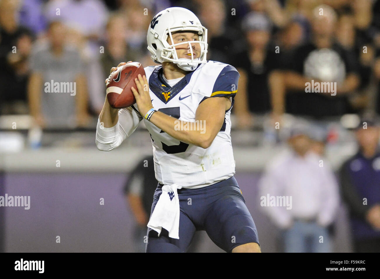 West Virginia quarterback Skyler Howard (3) looks to throw a pass ...