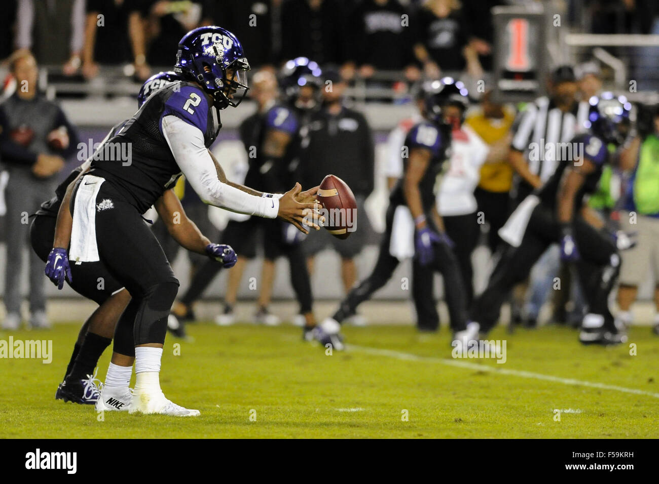 TCU quarterback Trevone Boykin (2) takes the snap from center during an ...