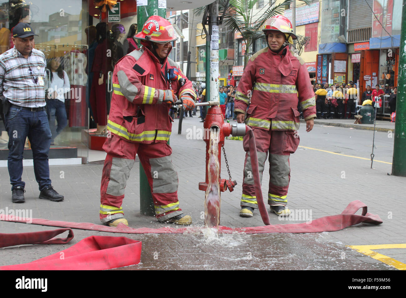 Lima, Peru. 30th Oct, 2015. Members of the General Volunteer Fire ...