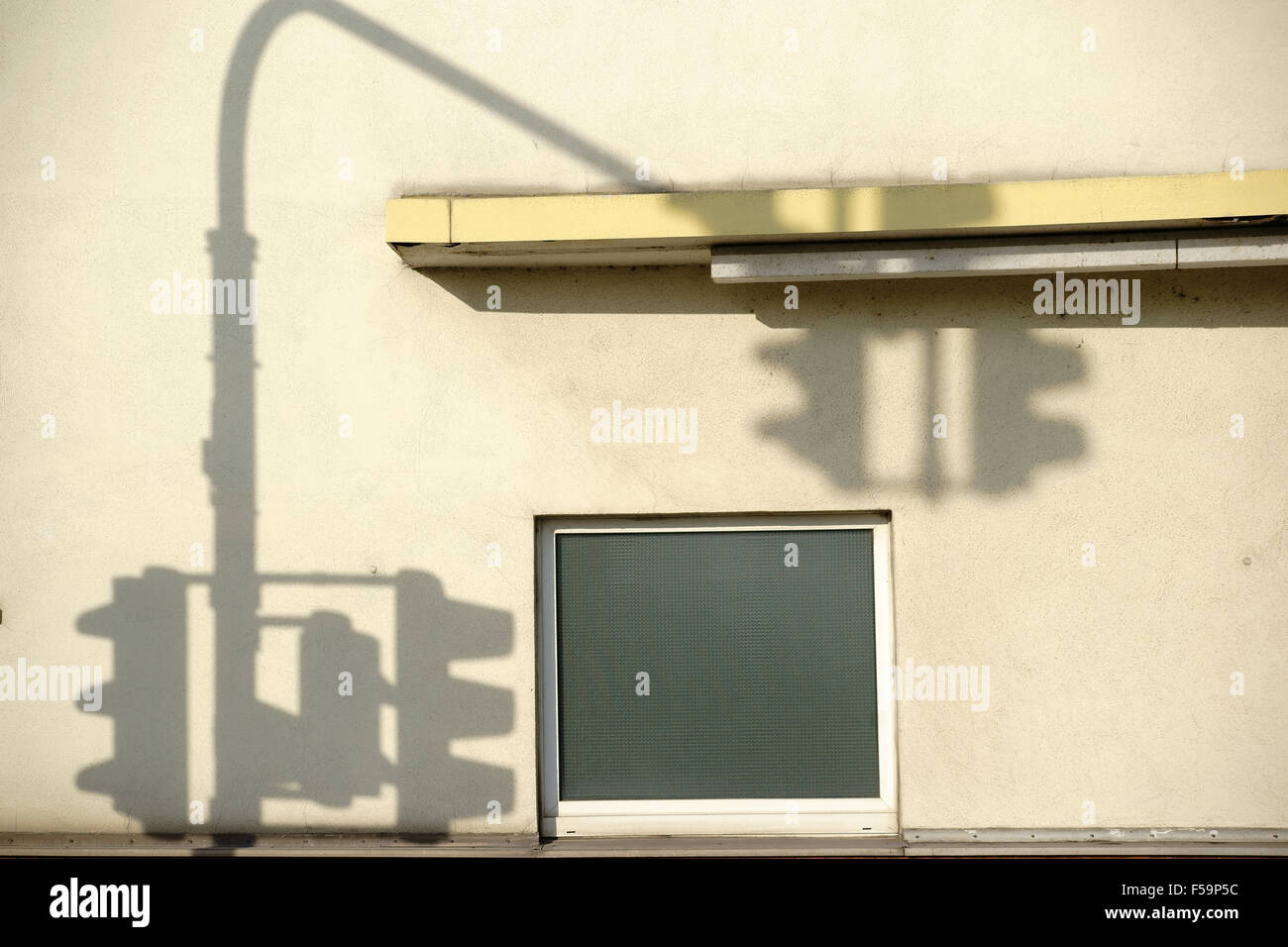 Basement window with traffic light Stock Photo - Alamy