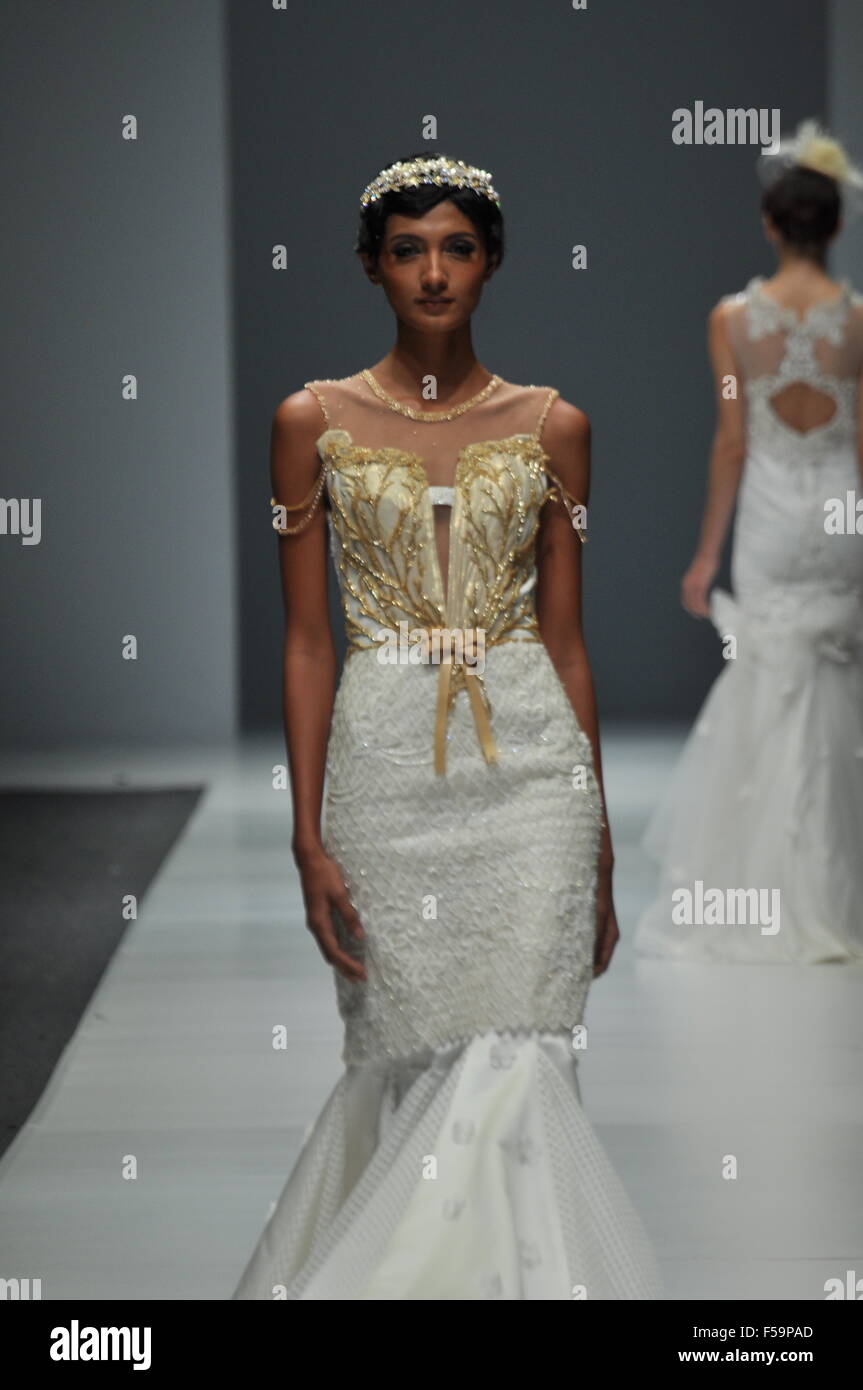 Jakarta, Indonesia. 30th Oct, 2015. A model wears design by Adrianne ...
