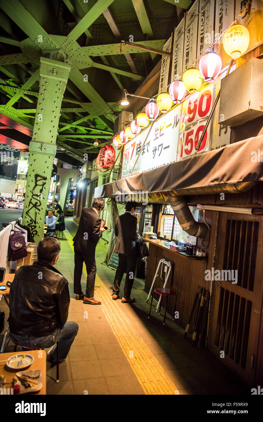 Street scene around Yurakucho station,Minato-Ku,Tokyo,Japan Stock Photo ...