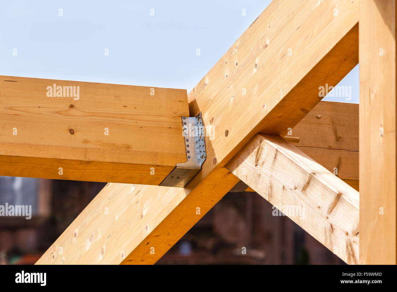 Construction of new wooden house. Beams frame close up Stock Photo - Alamy