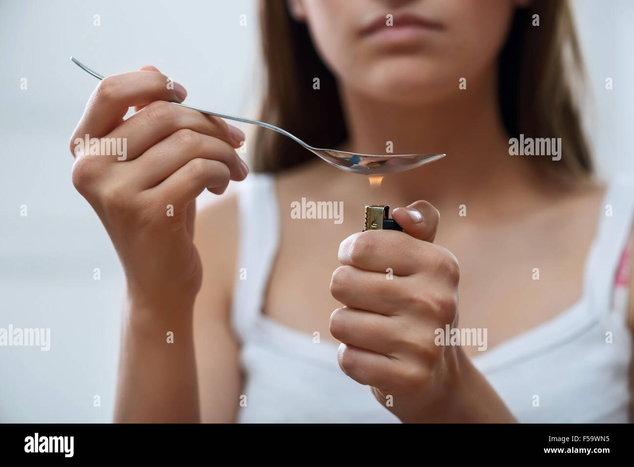 Taking drugs hi-res stock photography and images - Alamy