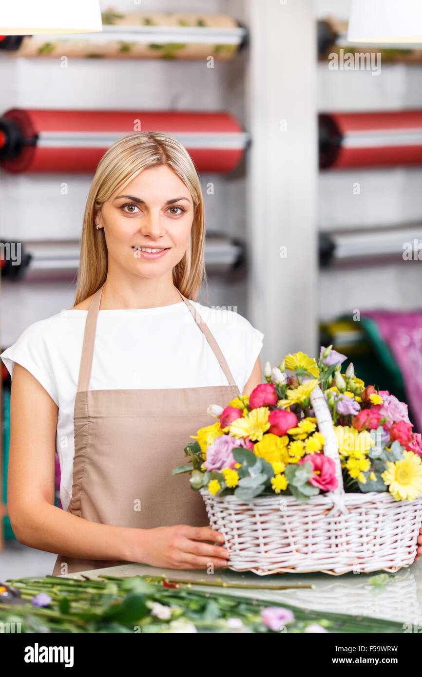Professional florist working in a flower shop Stock Photo - Alamy