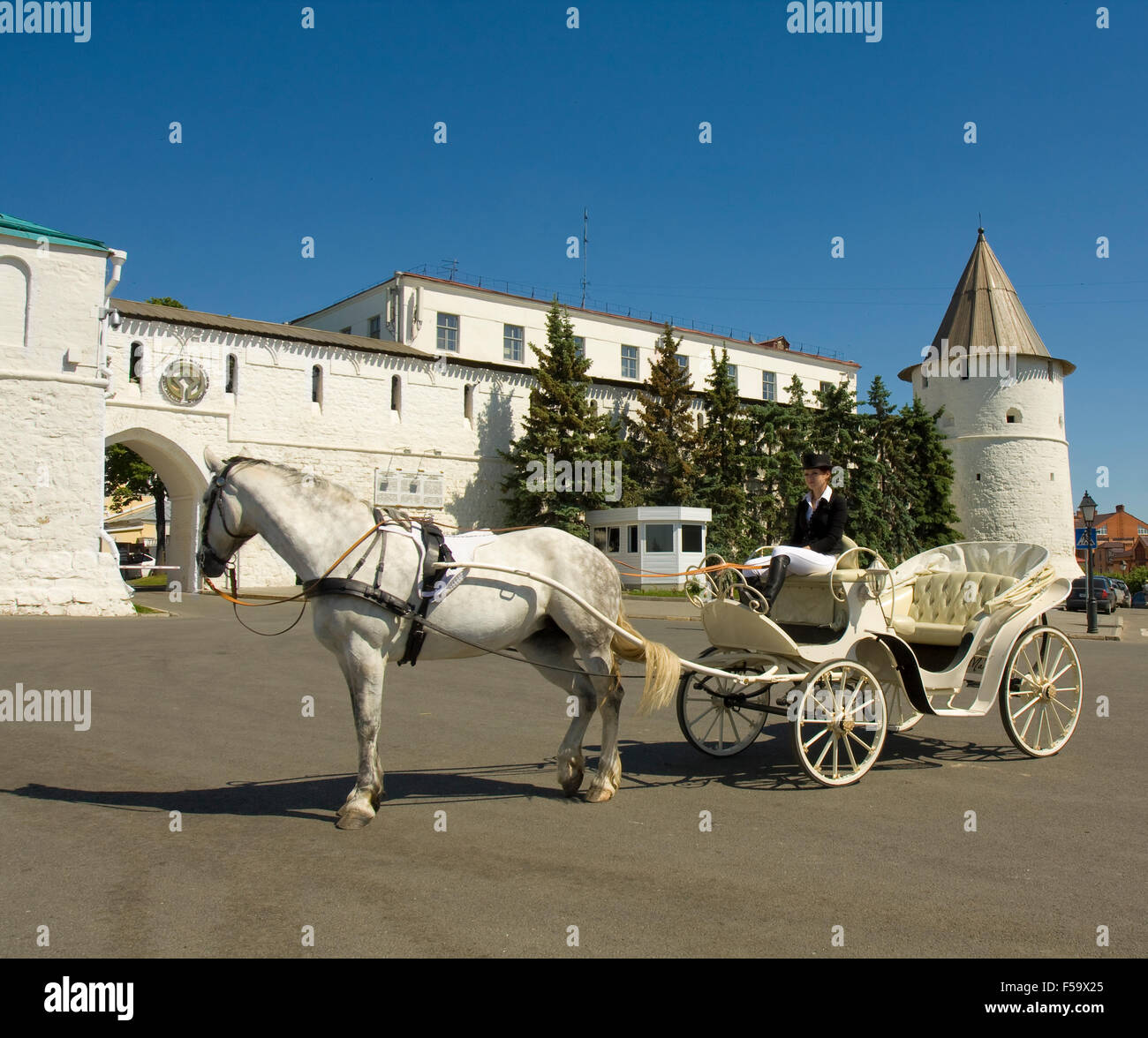 KAZAN, RUSSIA - MAY 31: horse with carriage for tourists near Kremlin ...