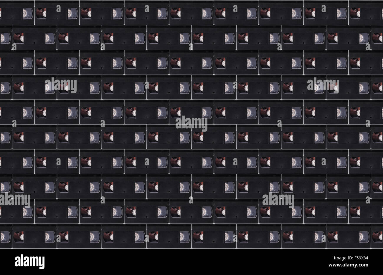 Wall from bricks in the form of VHS videotapes Stock Photo - Alamy
