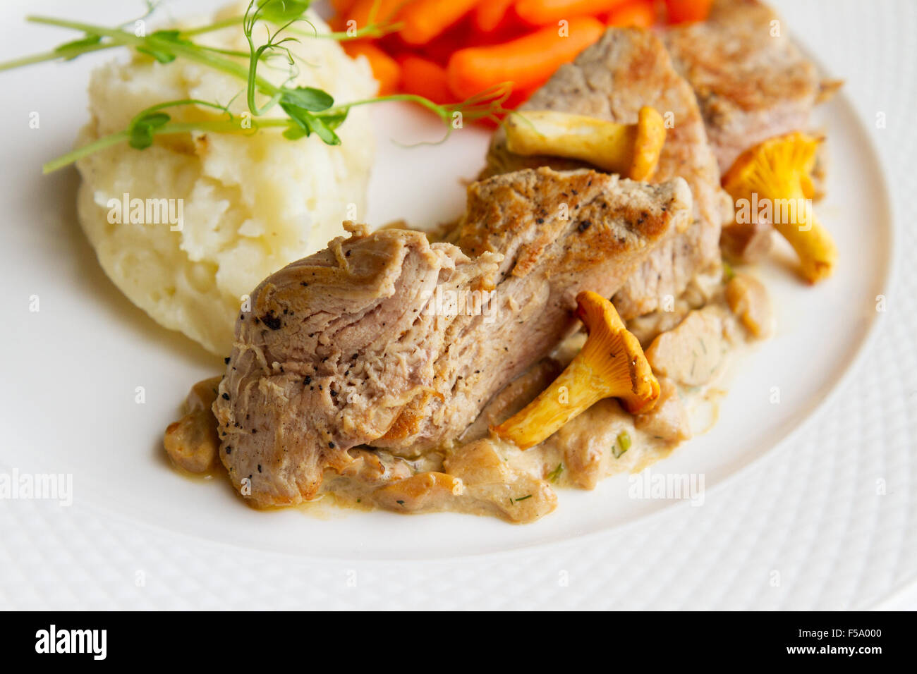 Pork with mushrooms Stock Photo - Alamy